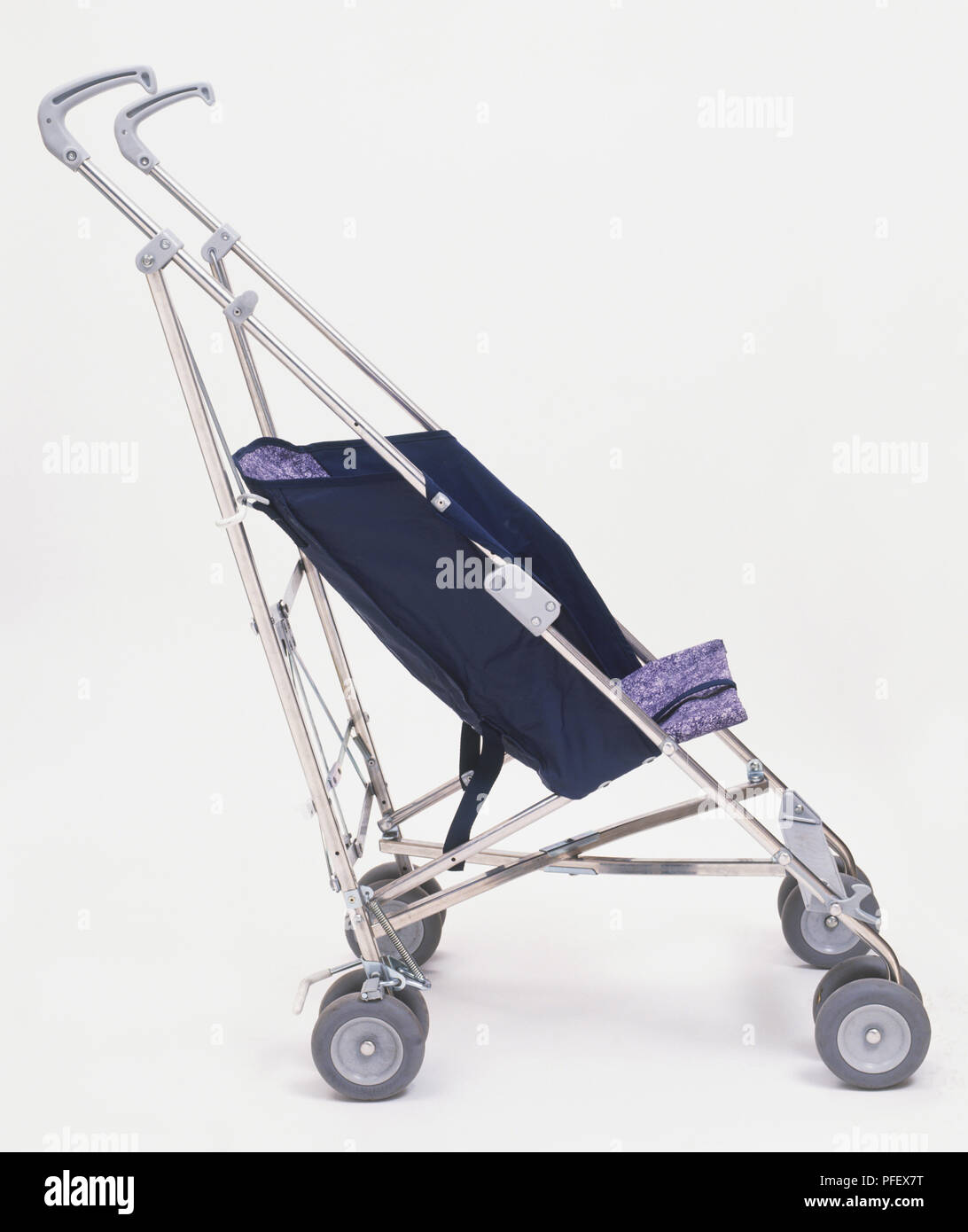 Buggy with blue textile seat, side view Stock Photo - Alamy