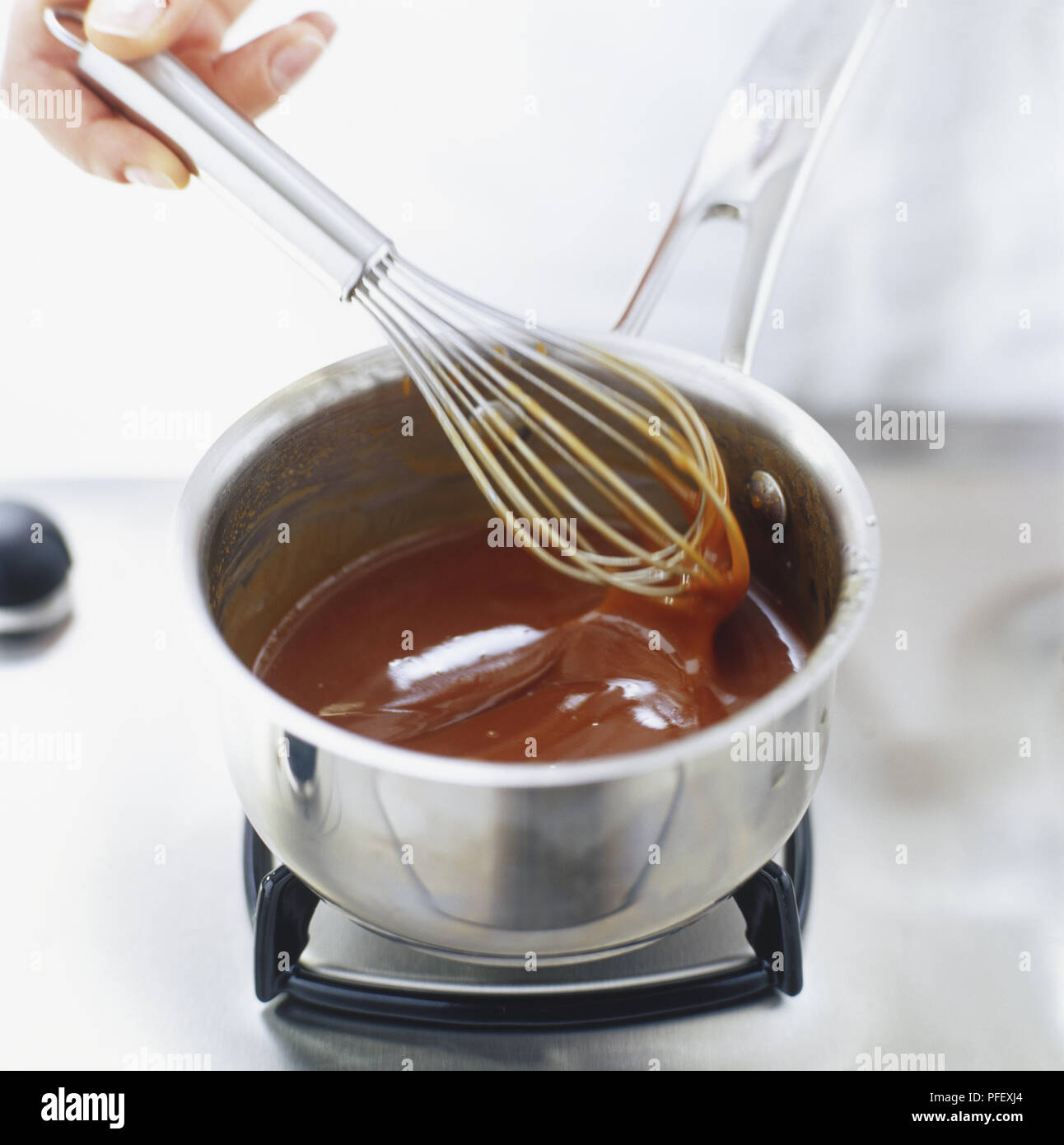 Sauce whisking hi-res stock photography and images - Alamy