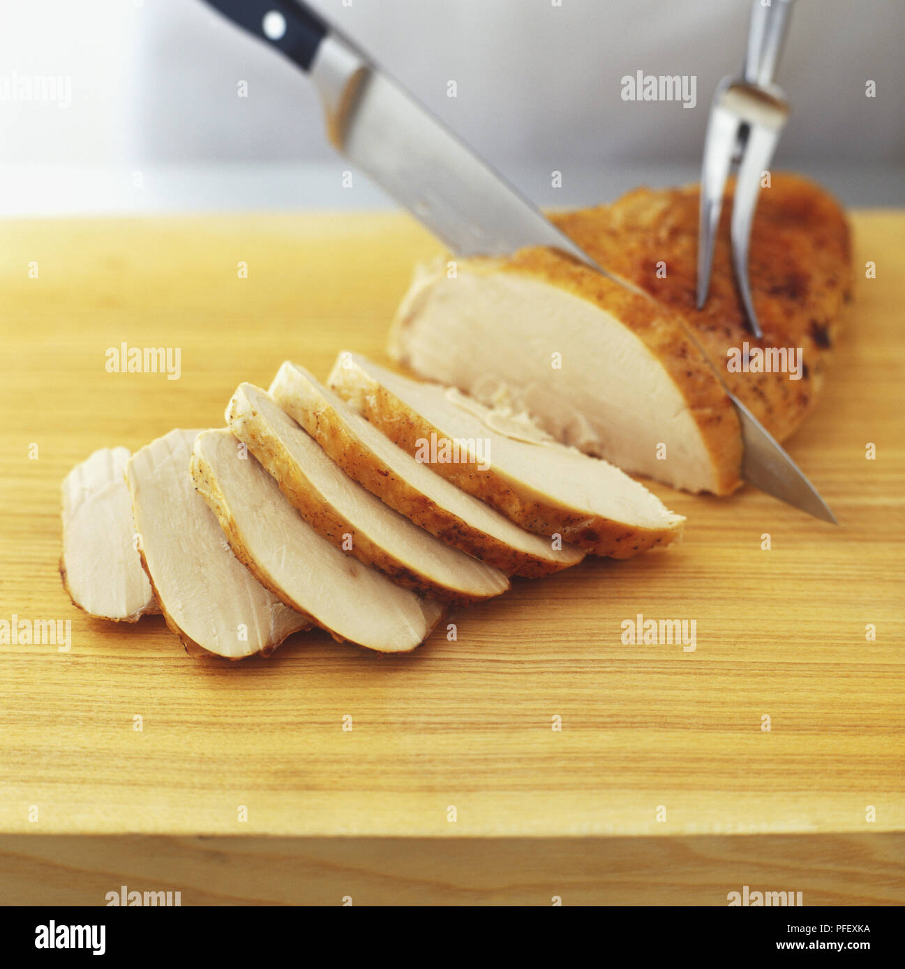 Wooden board carving fork knife hi-res stock photography and images - Alamy