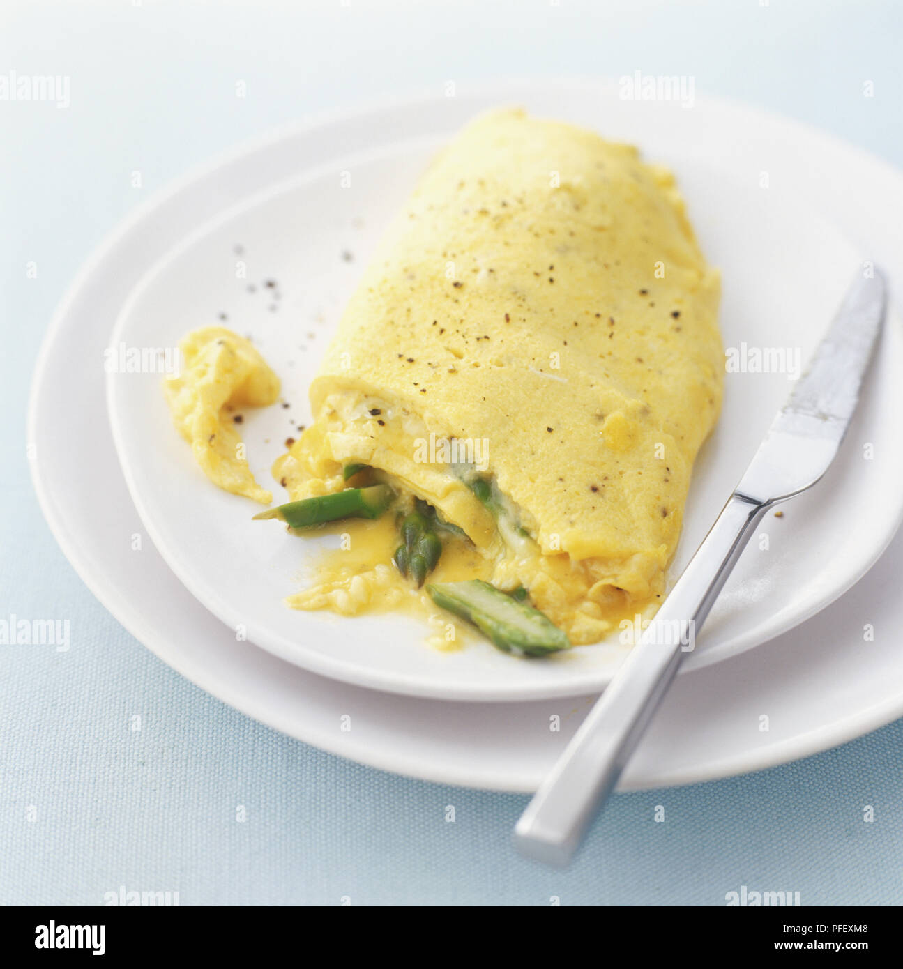 Folded omelette with knife hi-res stock photography and images - Alamy