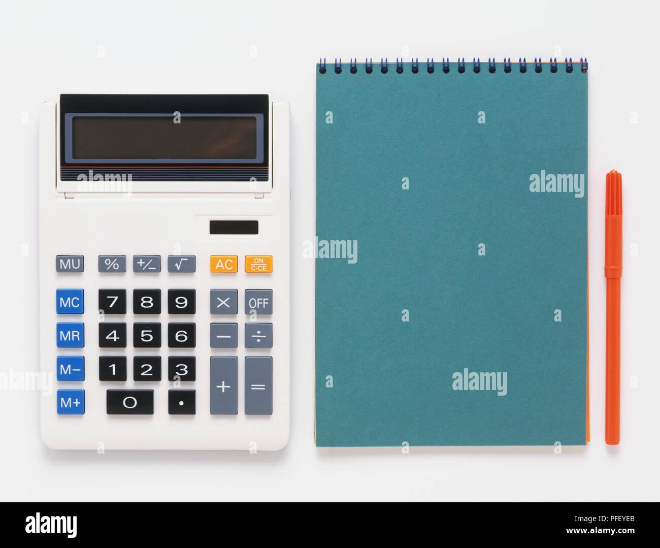 Pocket calculator, notepad, pen Stock Photo - Alamy