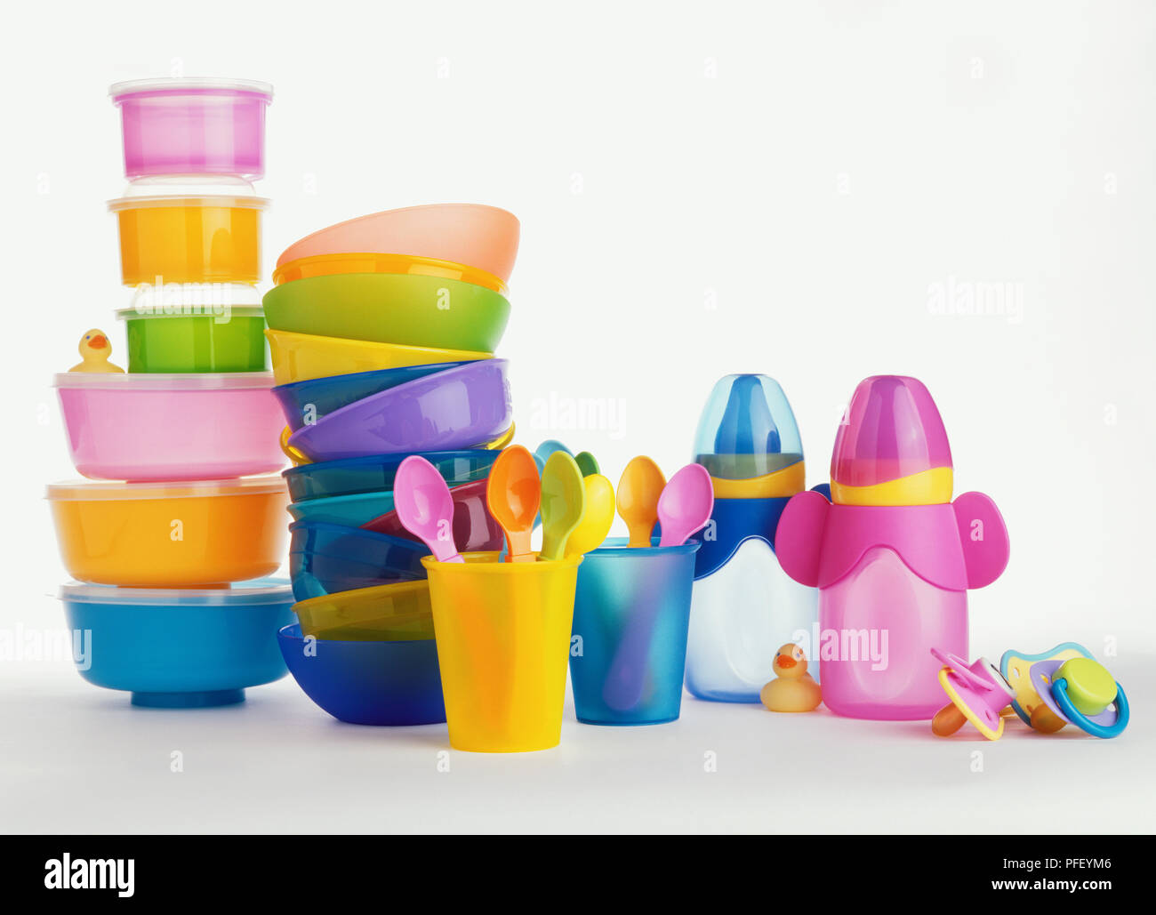 Selection of multi-coloured baby food containers, bottles, cups, spoons ...