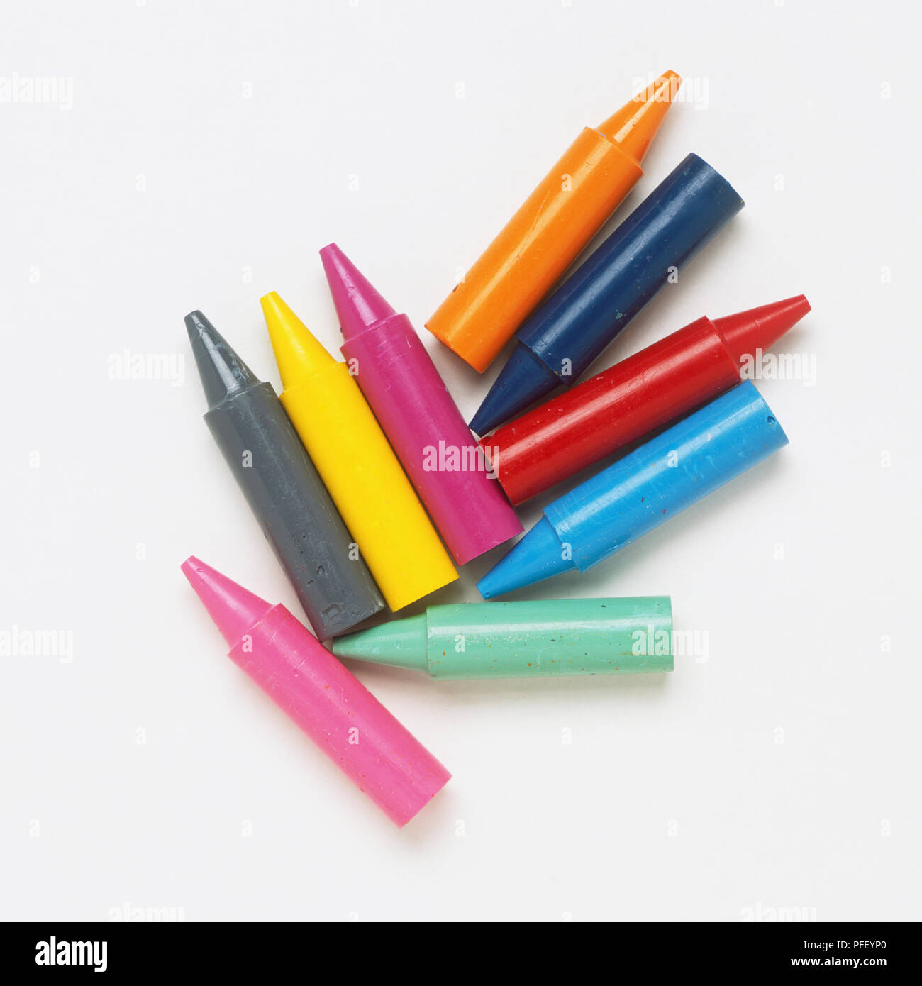 Nine different coloured crayons Stock Photo - Alamy