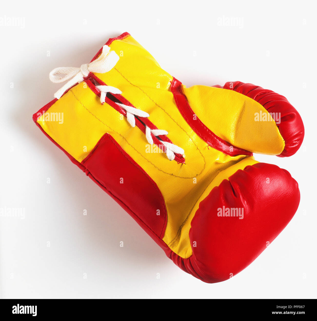 Red and yellow boxing glove, palm side up Stock Photo - Alamy