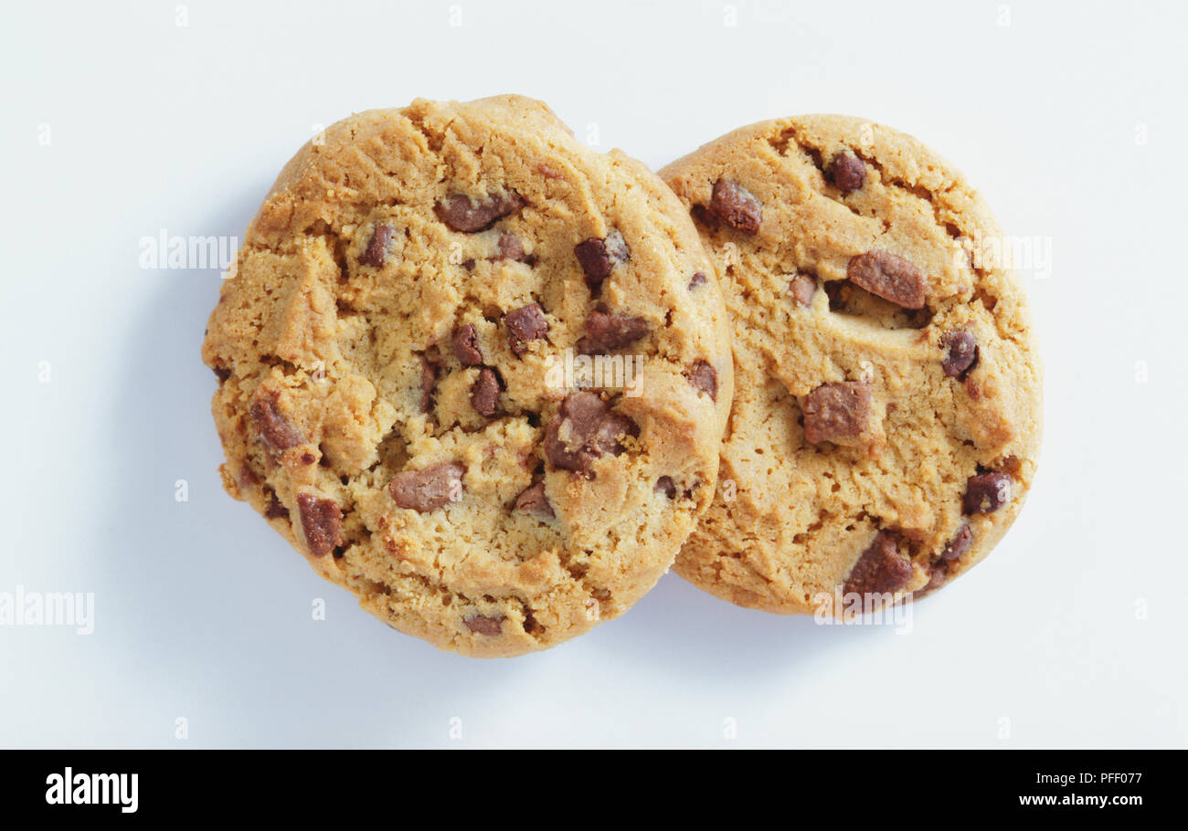 Two chocolate chip cookies Stock Photo - Alamy