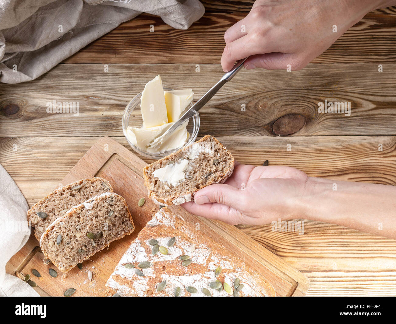 Person spreading bread butter hi-res stock photography and images - Alamy