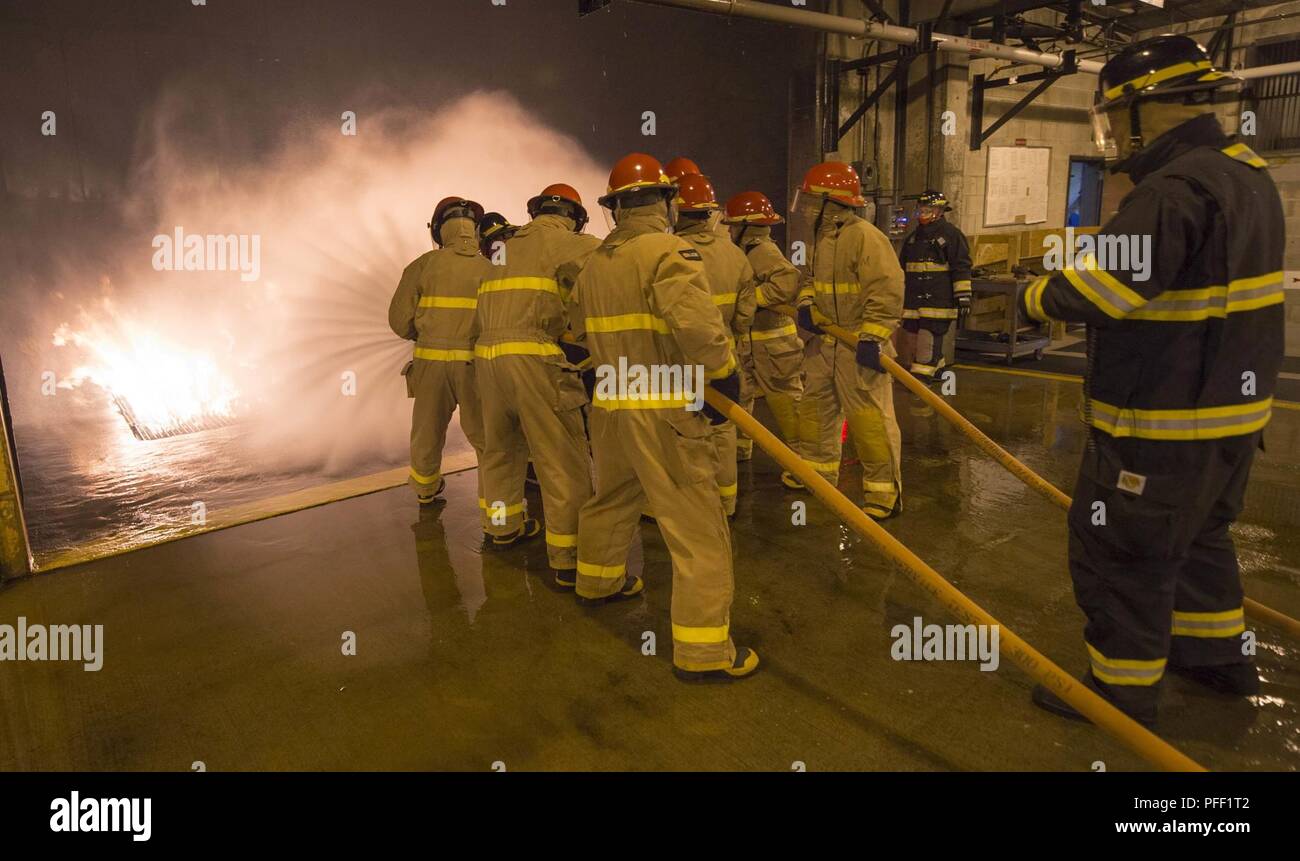 R.I. (June 11, 2018) Naval ROTC Midshipmen combat a simulated class ...