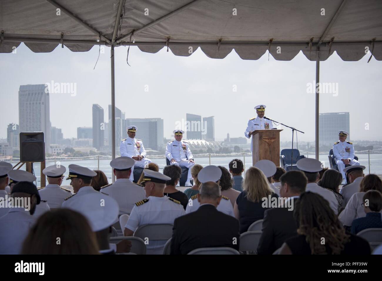 SAN DIEGO (June 12, 2018) Rear Adm. Alvin Holsey, center, gives remarks ...