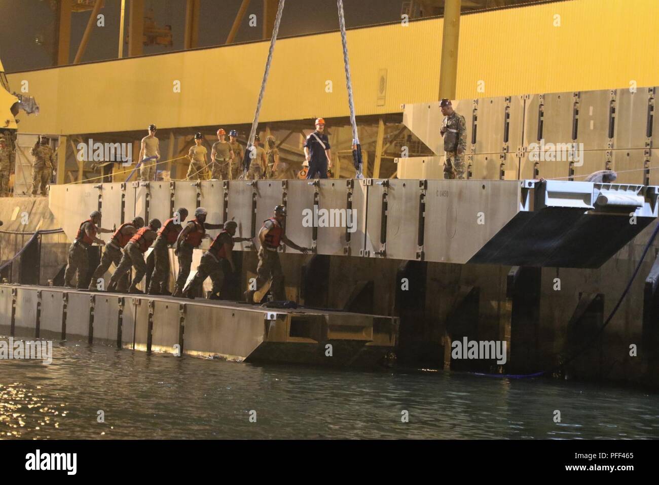 SHUIABA PORT, Kuwait – Members of the 331st Transportation Company work ...