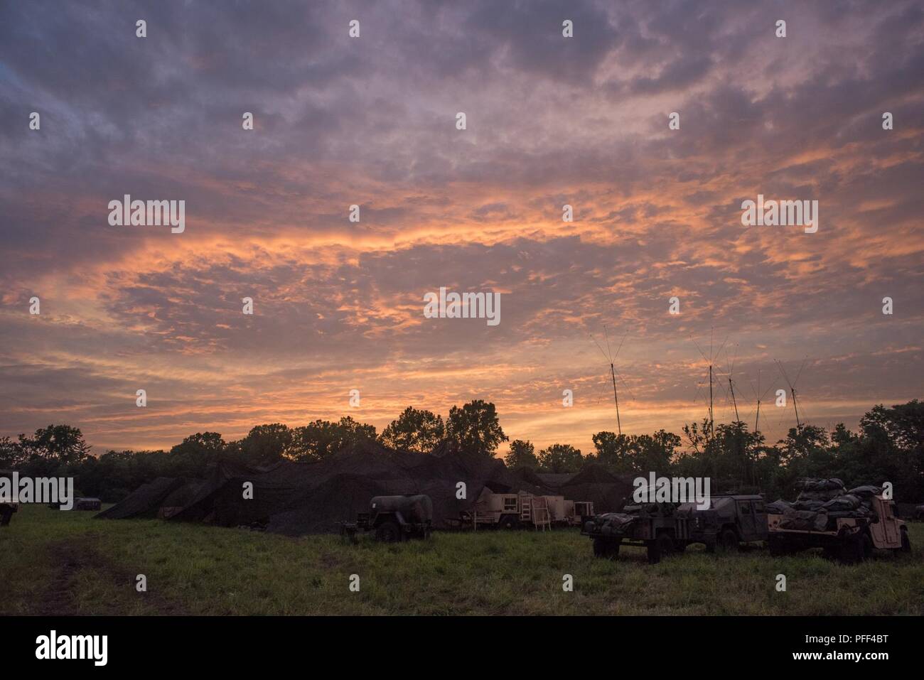 The sun sets over the Oklahoma Army National Guard, 45th Field ...
