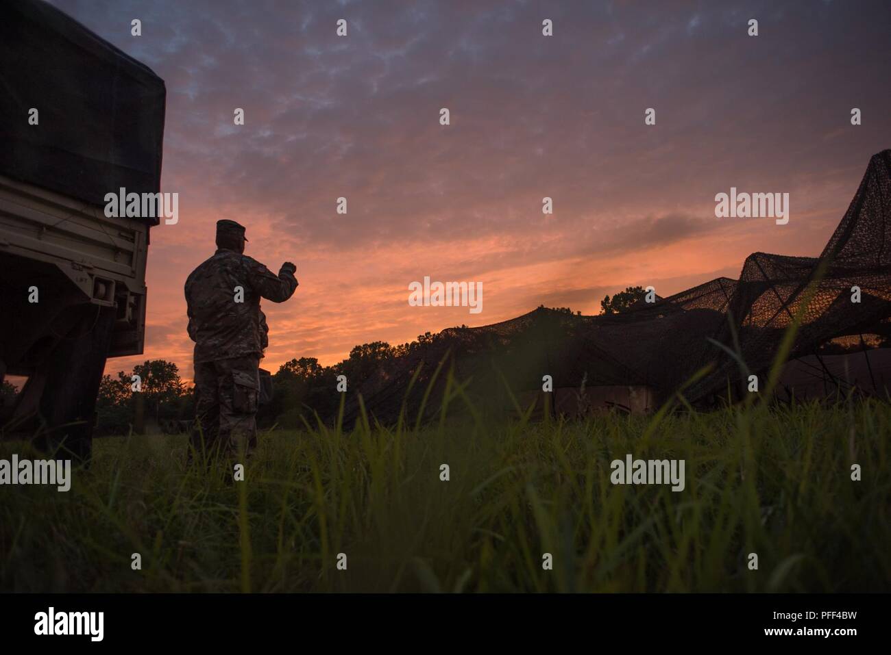 Maj. Brandon Mackey, observer coachtrainer with the Mission Command ...