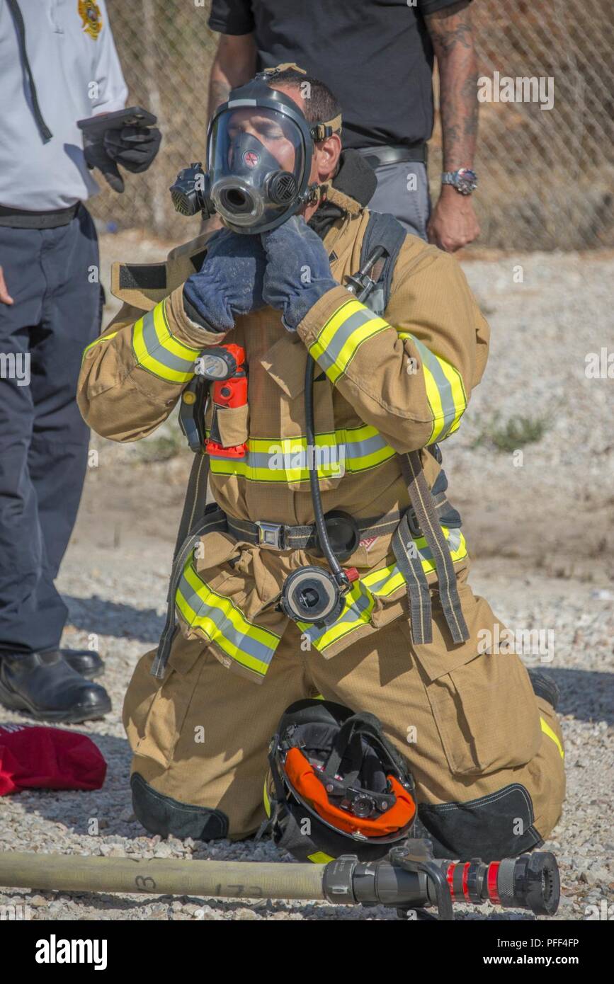 Firefighter breathing apparatus during training hi-res stock ...