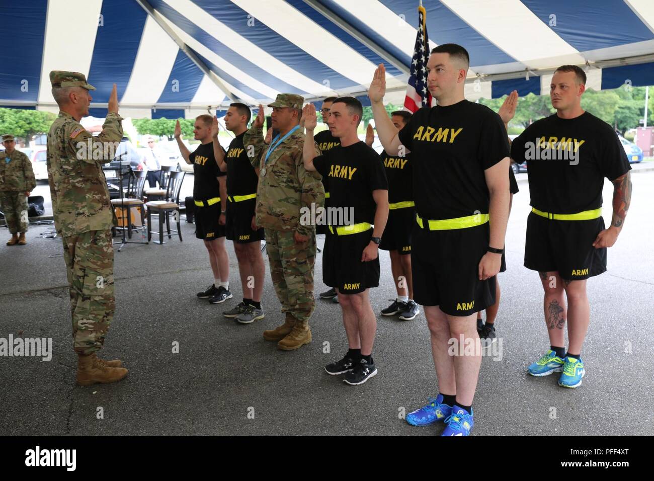 Ten Soldiers take the Army's oath of enlistment with Maj. Gen. James F ...