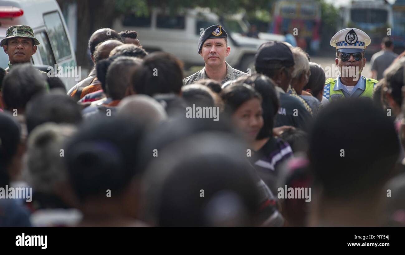 U.S. Air Force Master Sgt. Justin Haggerty, center, the 18th Security ...