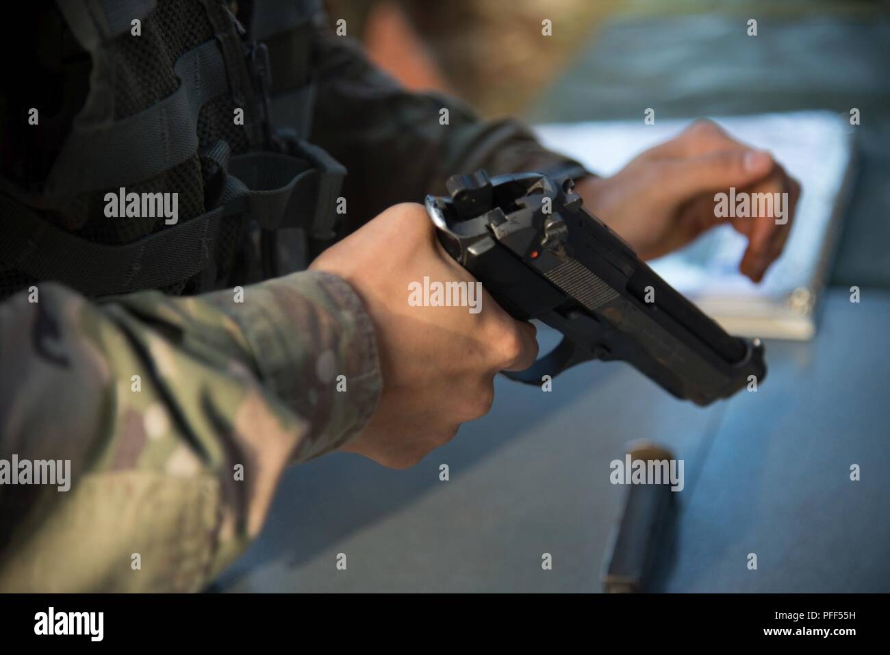 Spc. Emily Moller, a chemical, biological, radiological, and nuclear ...