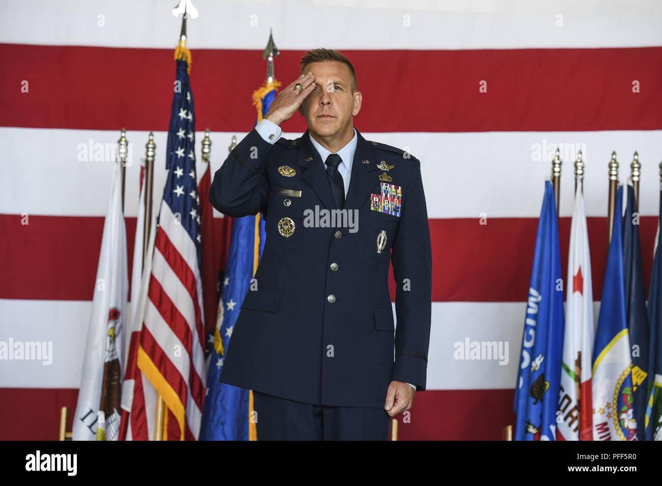 Col. Richard Goodman, 5th Mission Support Group commander, salutes a ...