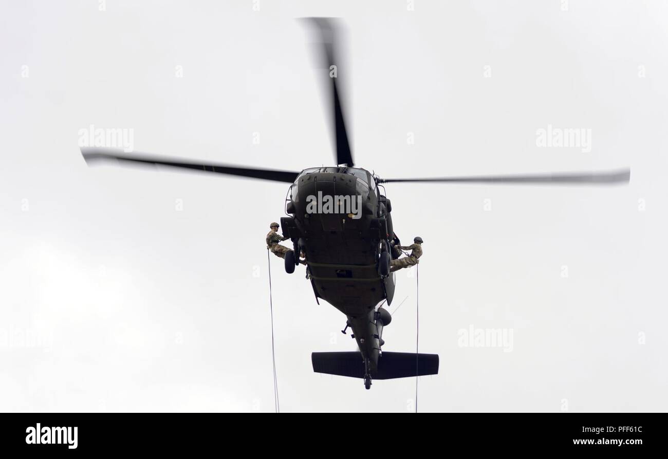 Two Army National Guard Soldiers prepare to rappel out of a Oregon Army ...