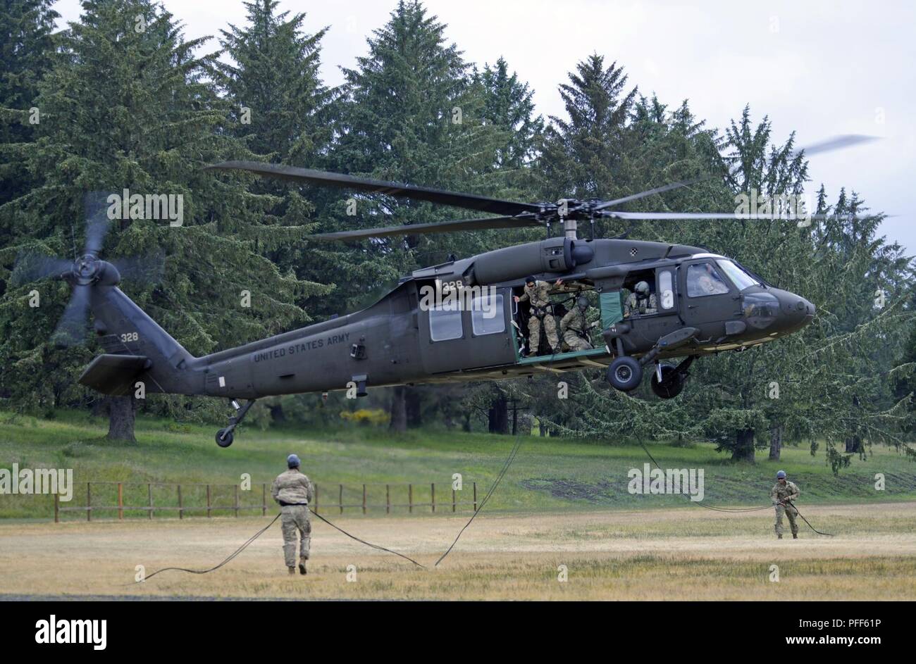 Rappelling And Black Hawk Helicopter High Resolution Stock Photography ...