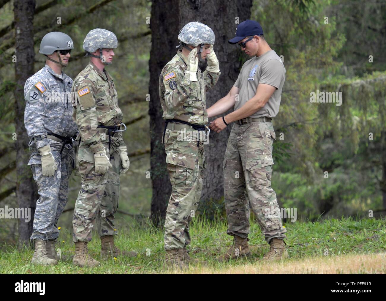 A Warrior Training Center instructor completes a Rappel Master ...