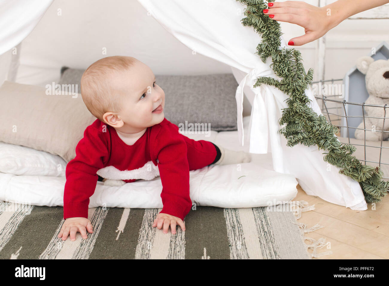 Cute baby in small tent Stock Photo - Alamy