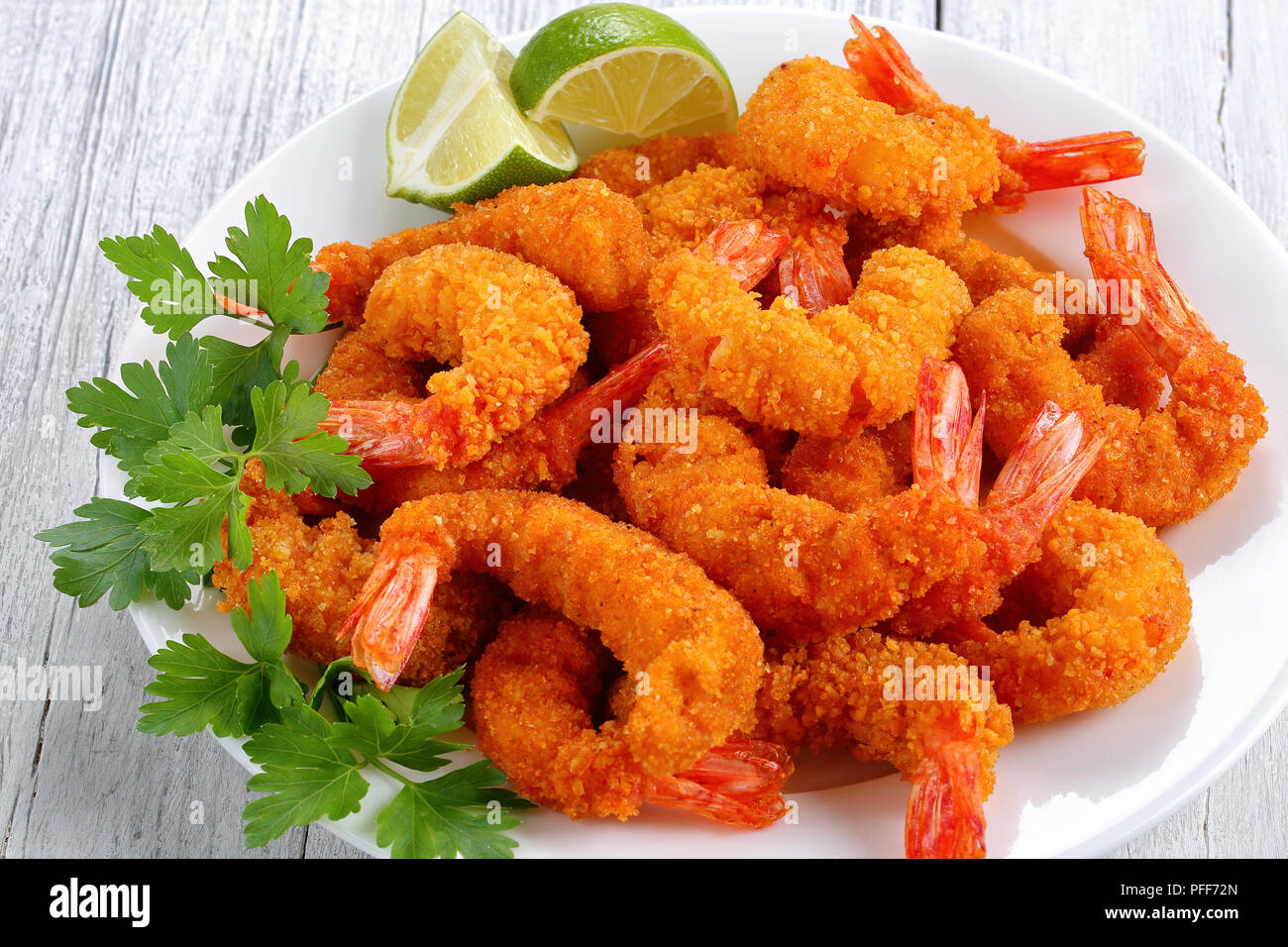 close-up of light and crispy crunchy bread crumbs coating Fried Shrimps ...