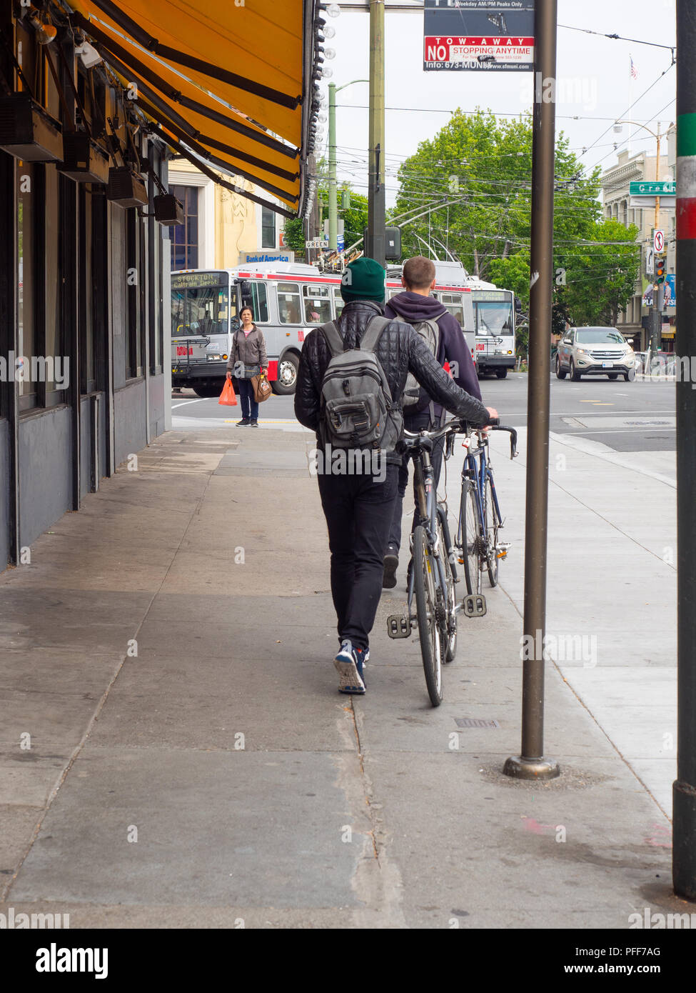 Cyclists pushing bicycles hi-res stock photography and images - Alamy