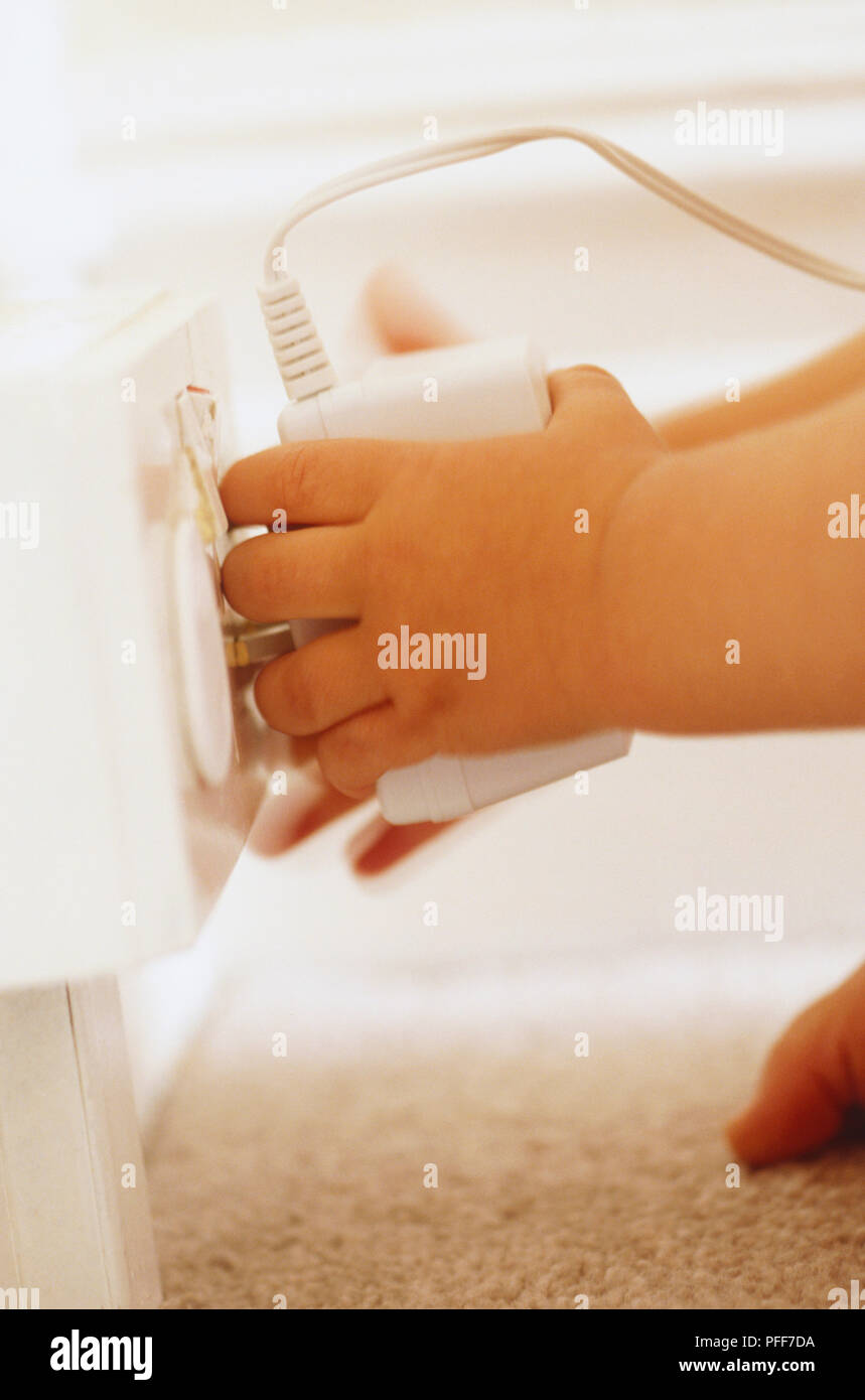 Child minding hi-res stock photography and images - Alamy