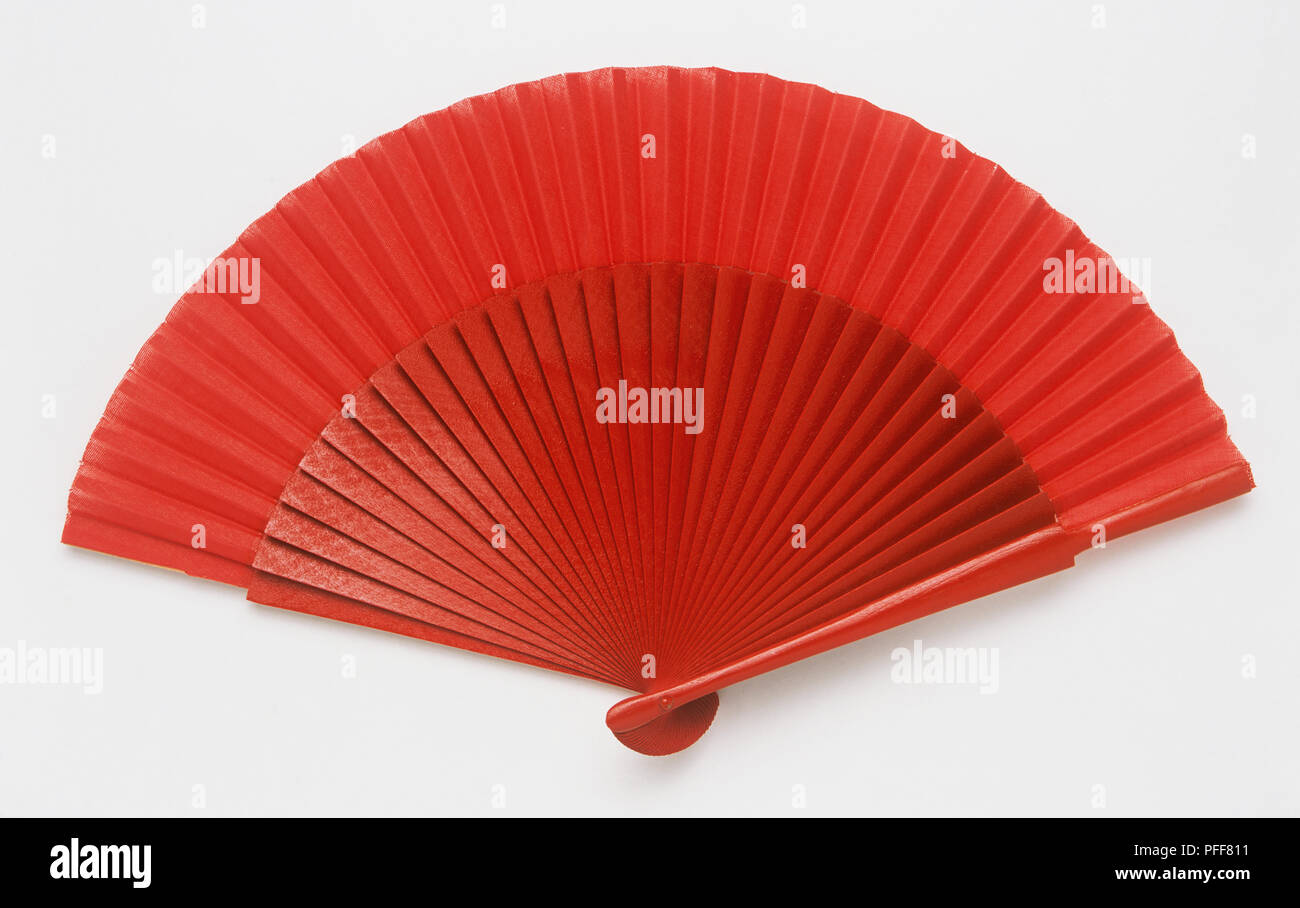 Opened red fan, front view Stock Photo - Alamy