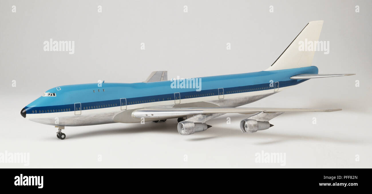 Model of blue jumbo jet, side view Stock Photo - Alamy