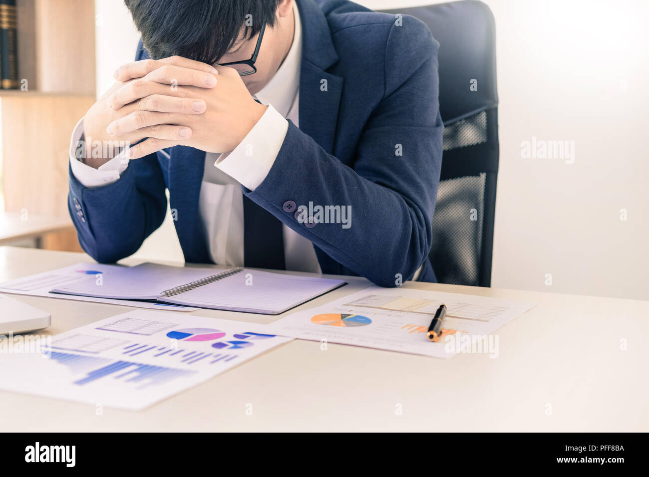 Depressed failure and tired businessman late sad and solving problem in ...