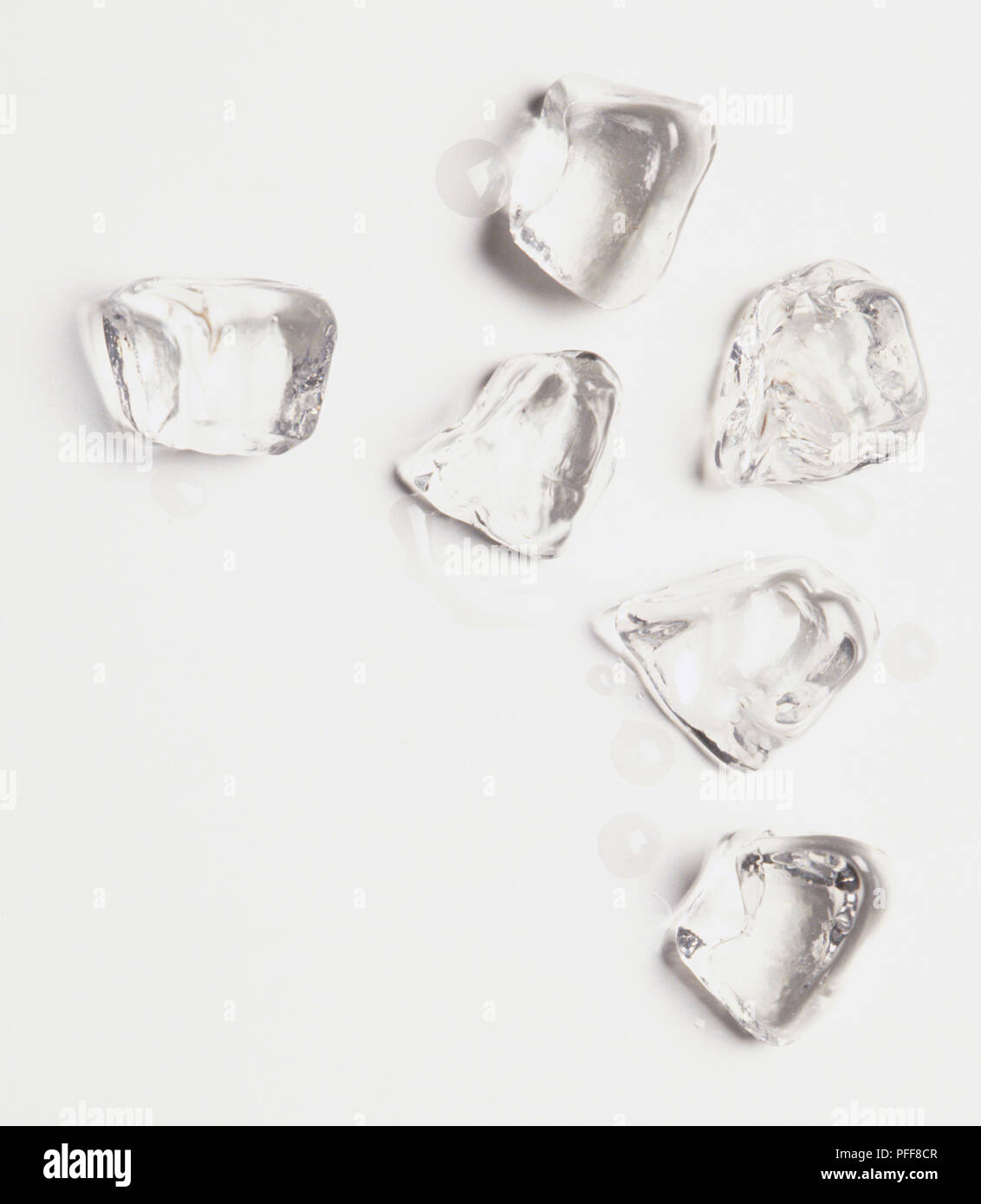 Six irregular shaped ice cubes Stock Photo - Alamy