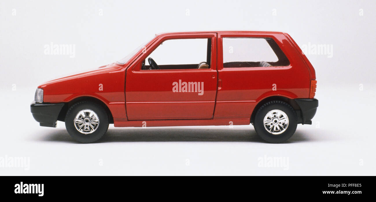 Model of small red car, side view Stock Photo - Alamy