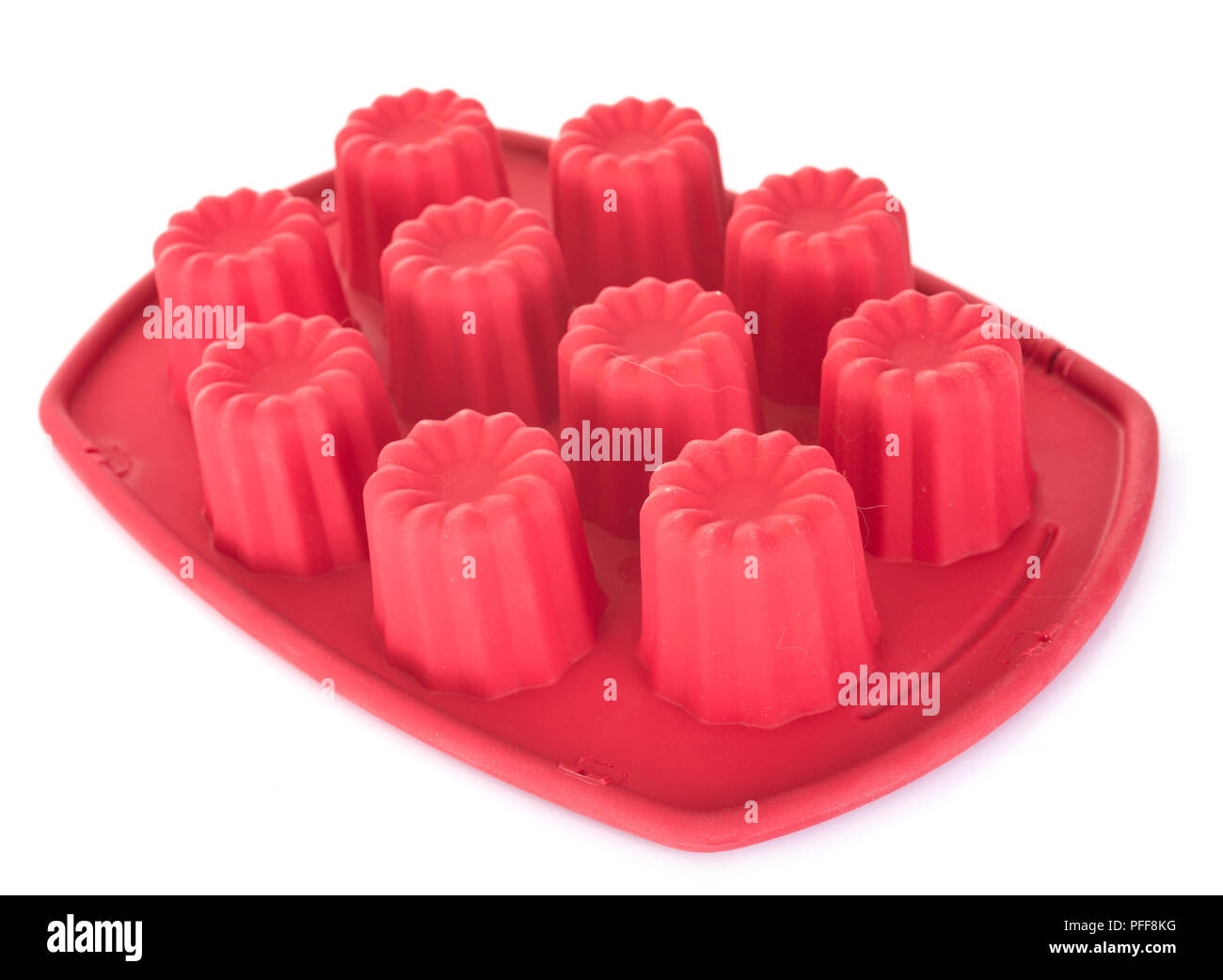 bakin pan for cannele in front of white background Stock Photo - Alamy