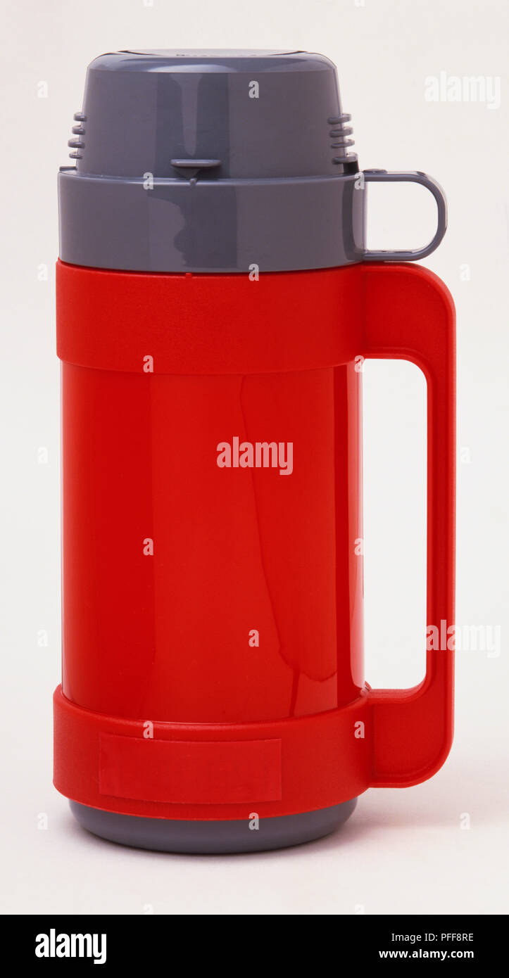 Red vacuum flask with grey lid Stock Photo - Alamy
