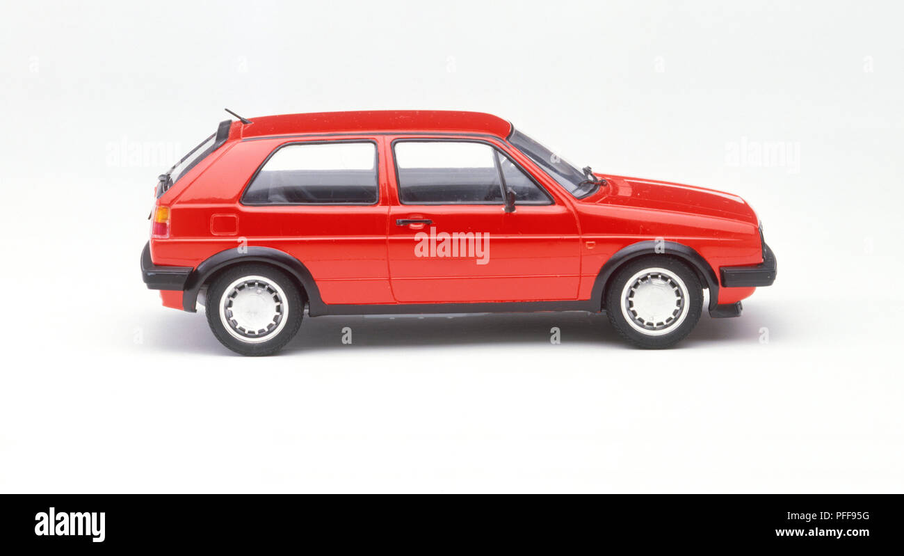 Red hatchback car, side view Stock Photo - Alamy