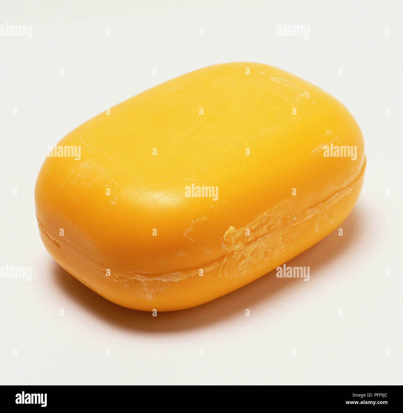 Yellow bar of soap Stock Photo - Alamy