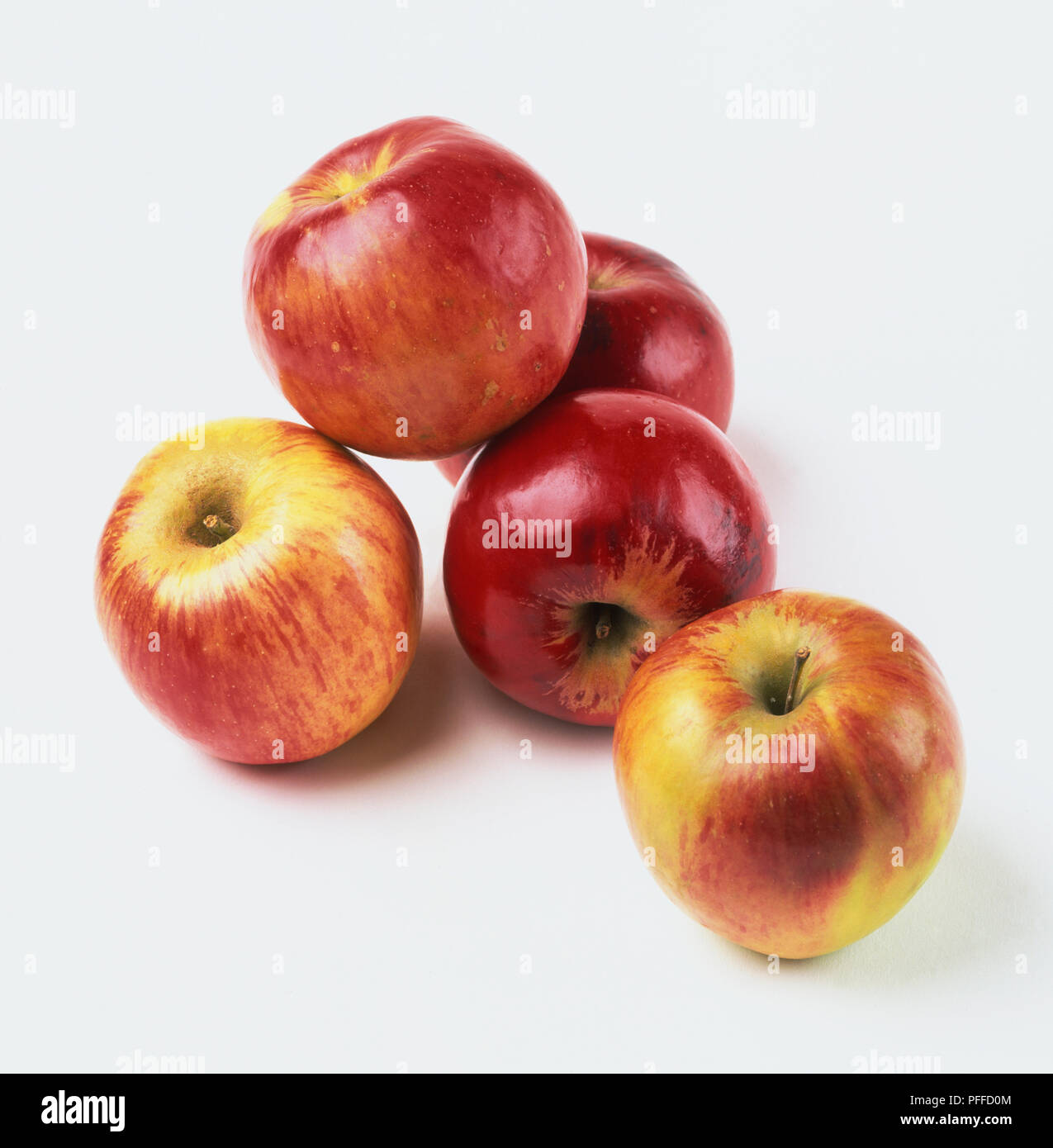 Five red and yellow apples Stock Photo - Alamy