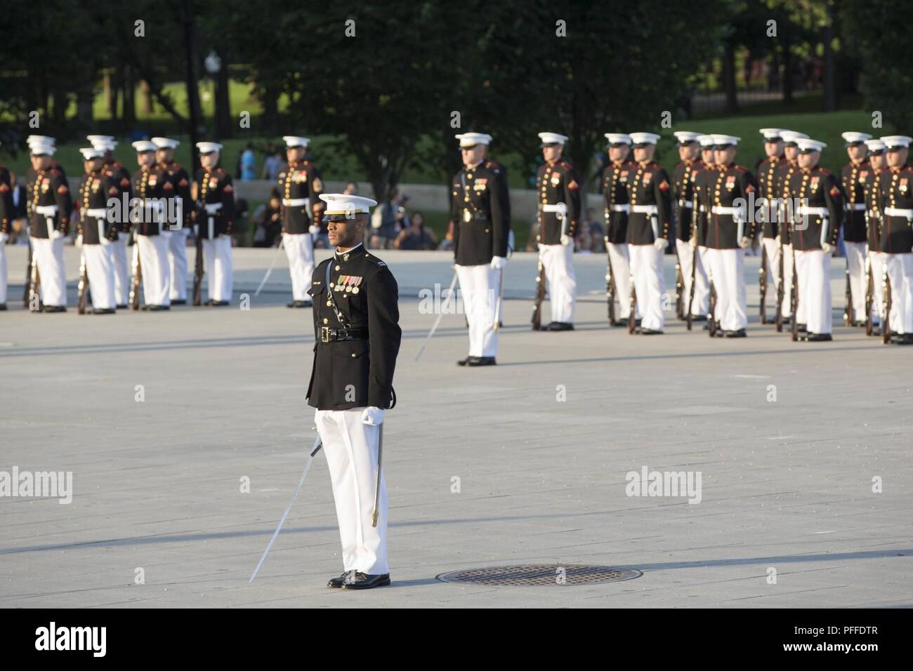Marine Barracks Washington hosts a sunset parade in honor of Robert ...