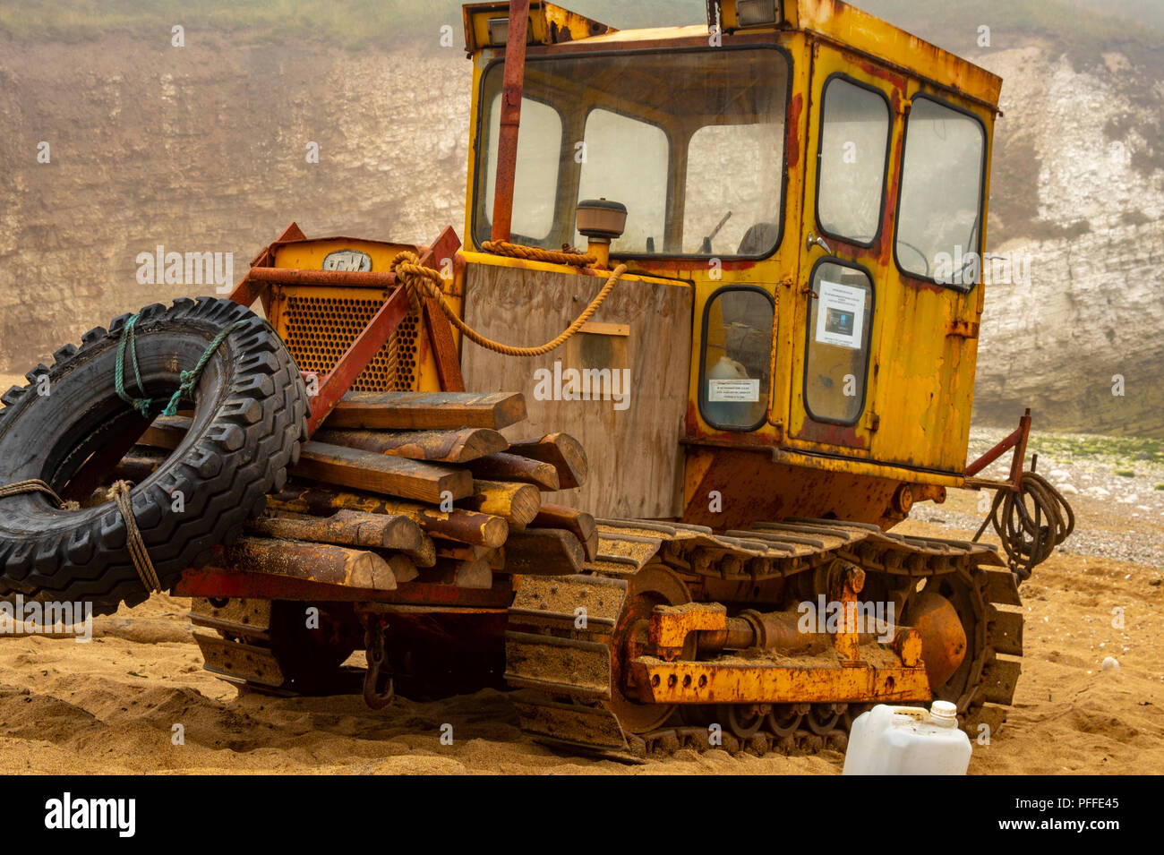 Bulldozers on the beach at Flamborough Stock Photo - Alamy
