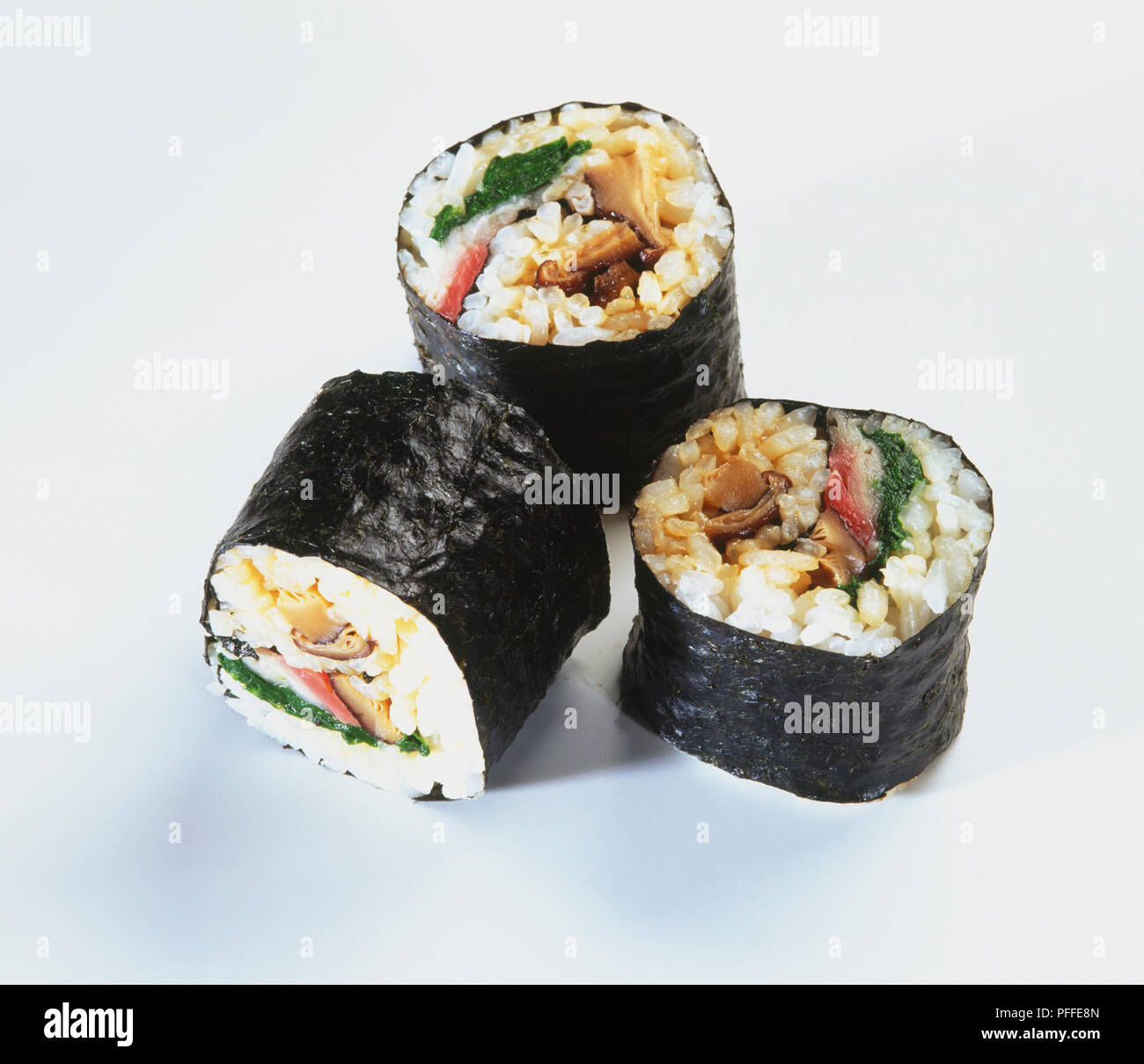 Three sushi rolls Stock Photo - Alamy