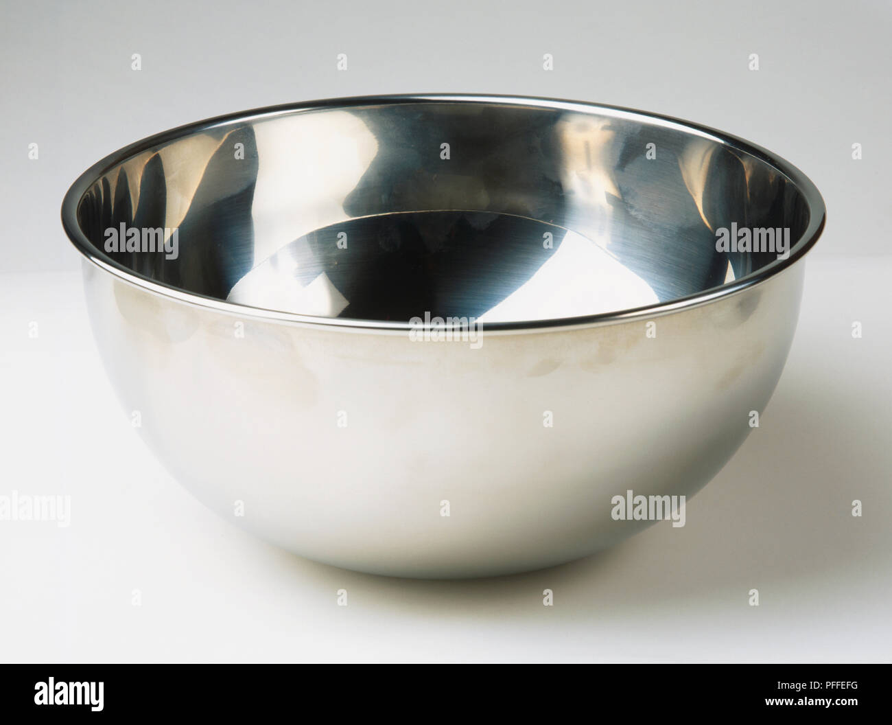 Large round steel bowl Stock Photo - Alamy