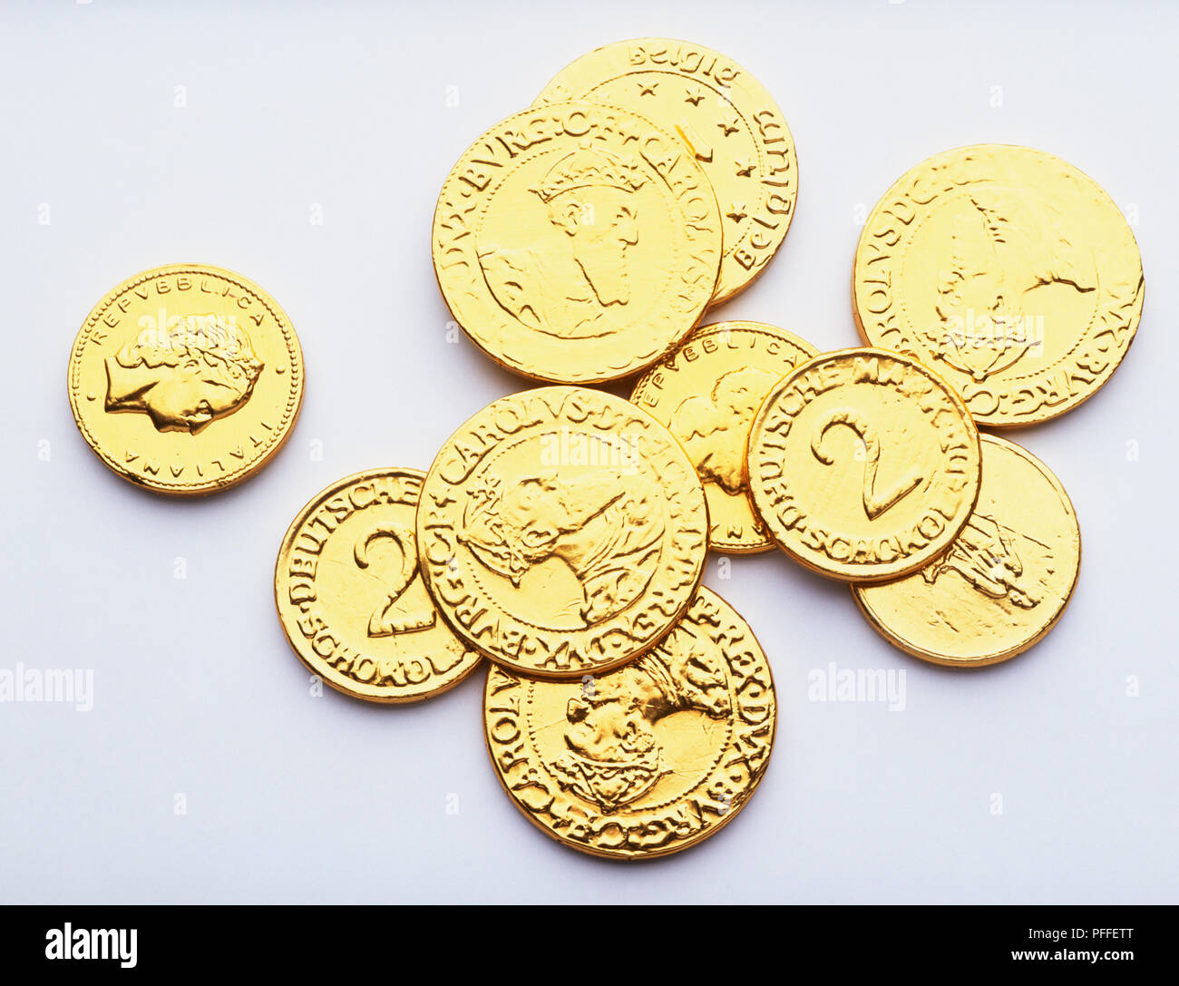 Toy gold coins Stock Photo - Alamy