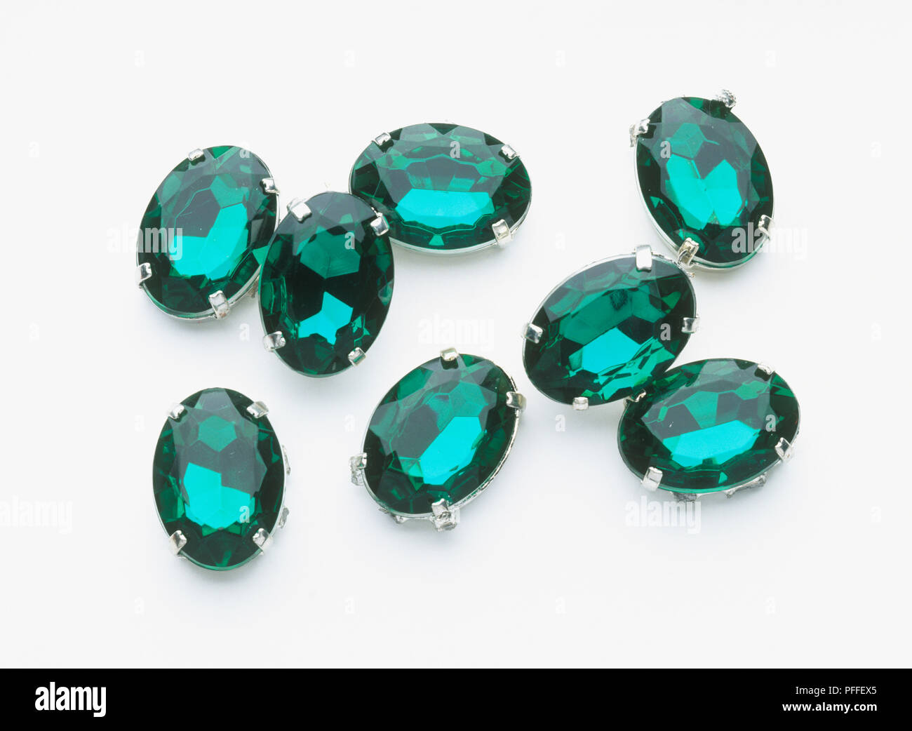 Eight green emeralds Stock Photo - Alamy