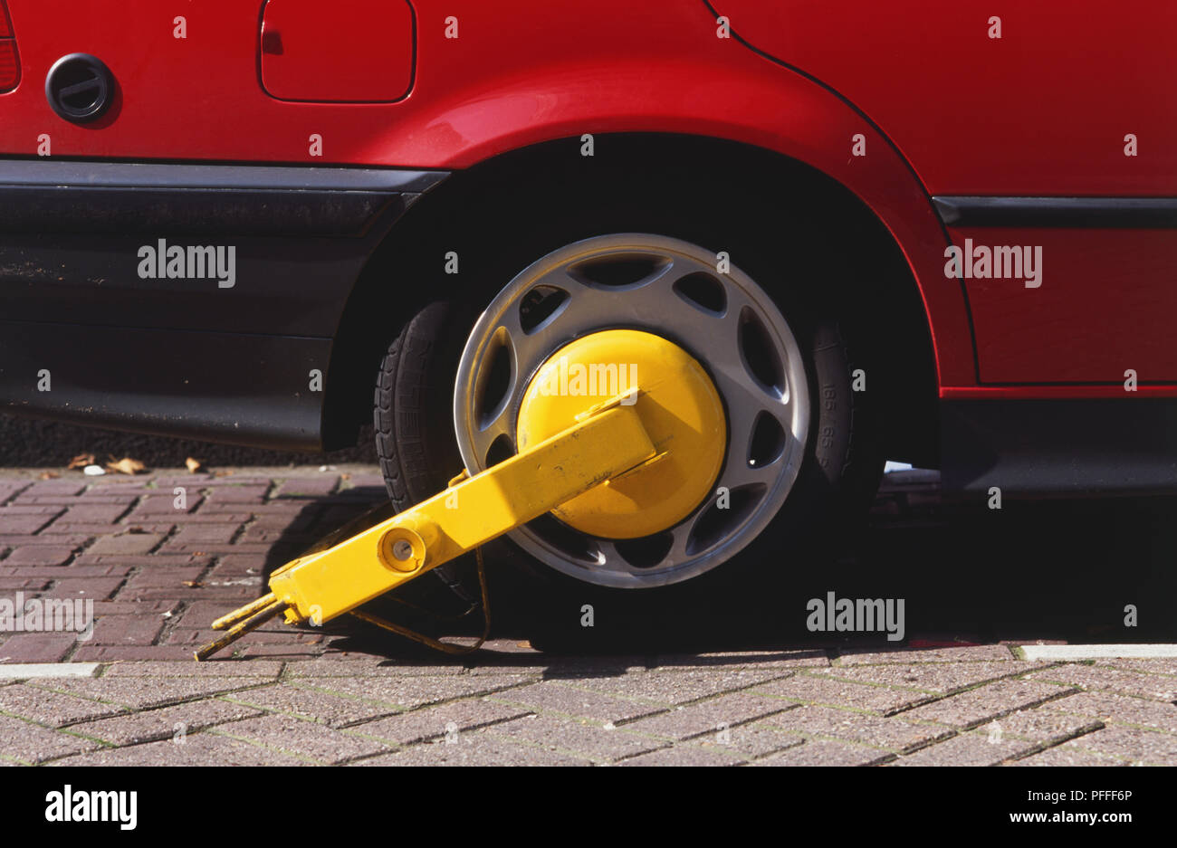 Red wheel clamp hi-res stock photography and images - Alamy