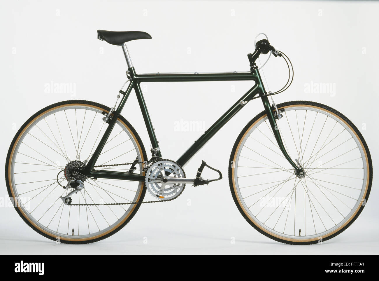 Green mountain bike, side view Stock Photo - Alamy