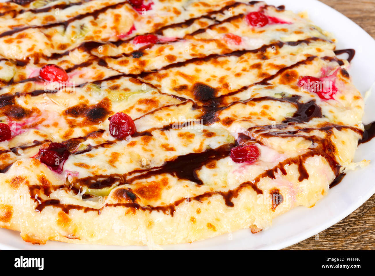 Sweet pizza with fruits and mozzarella Stock Photo - Alamy