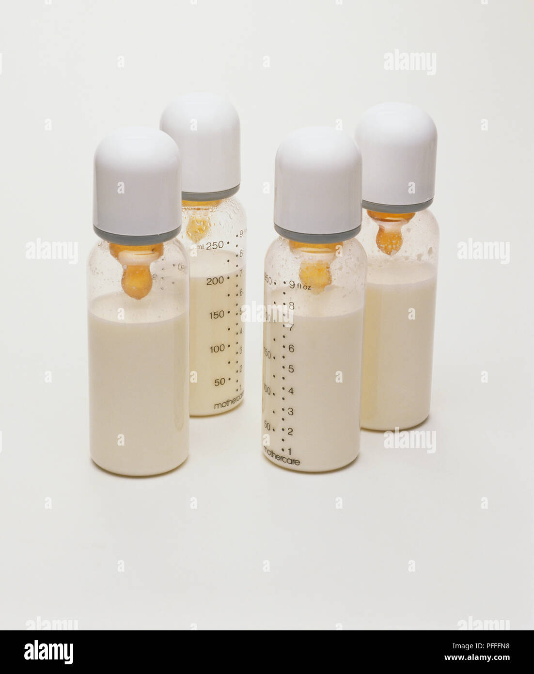 Formula milk in baby feeding bottles Stock Photo - Alamy