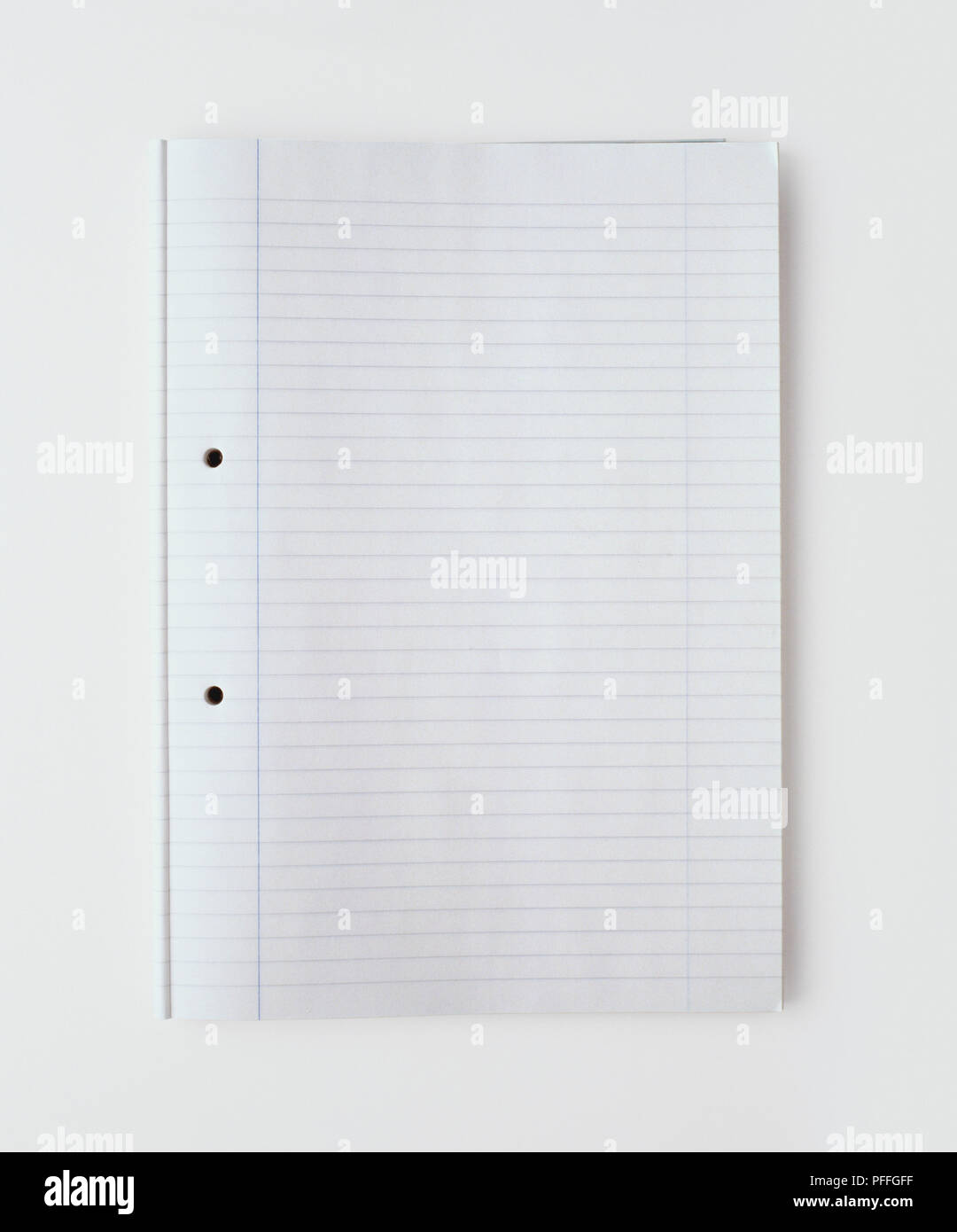 Page of lined writing paper in notebook Stock Photo - Alamy