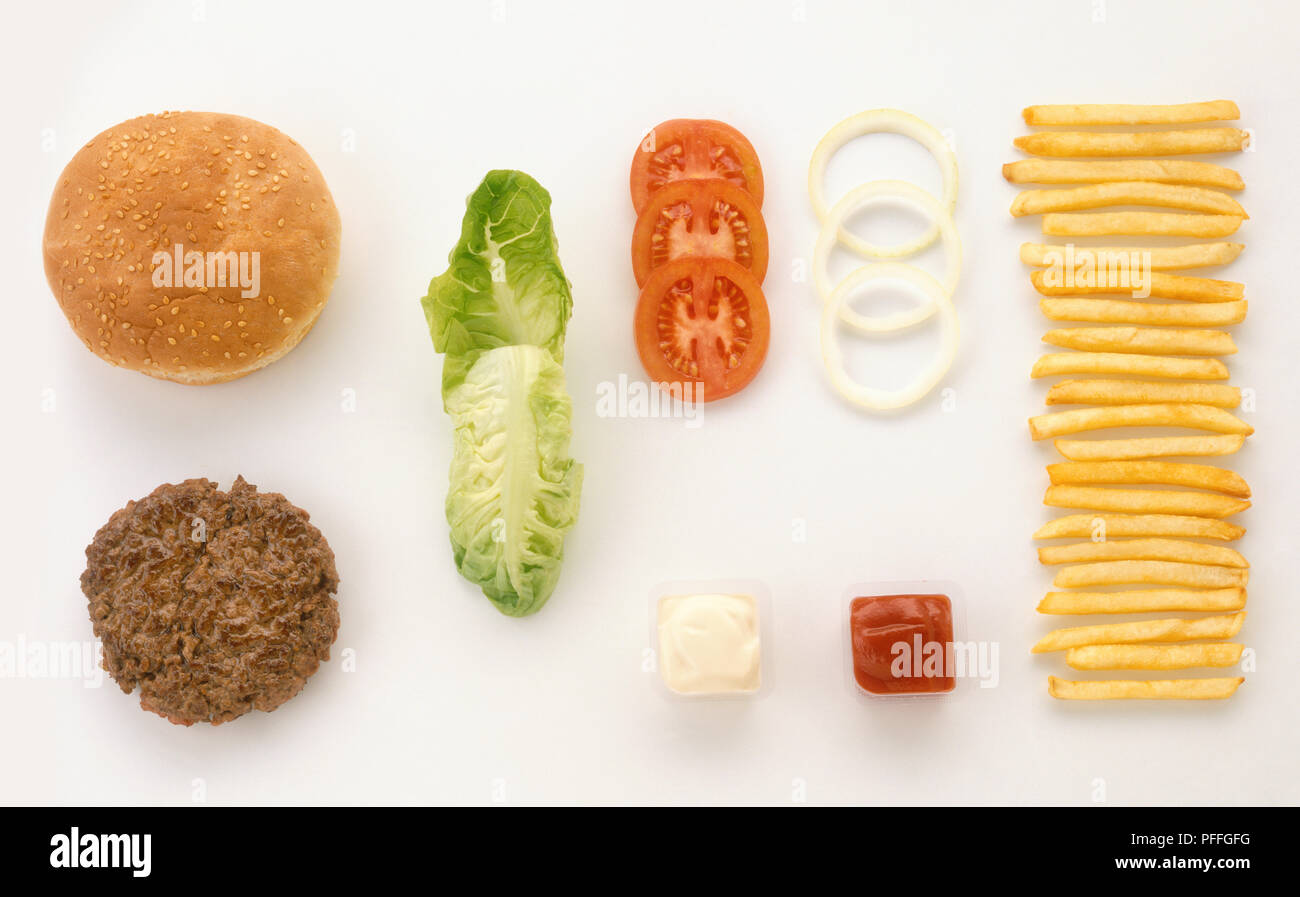 Ingredients of a hamburger and chips Stock Photo - Alamy