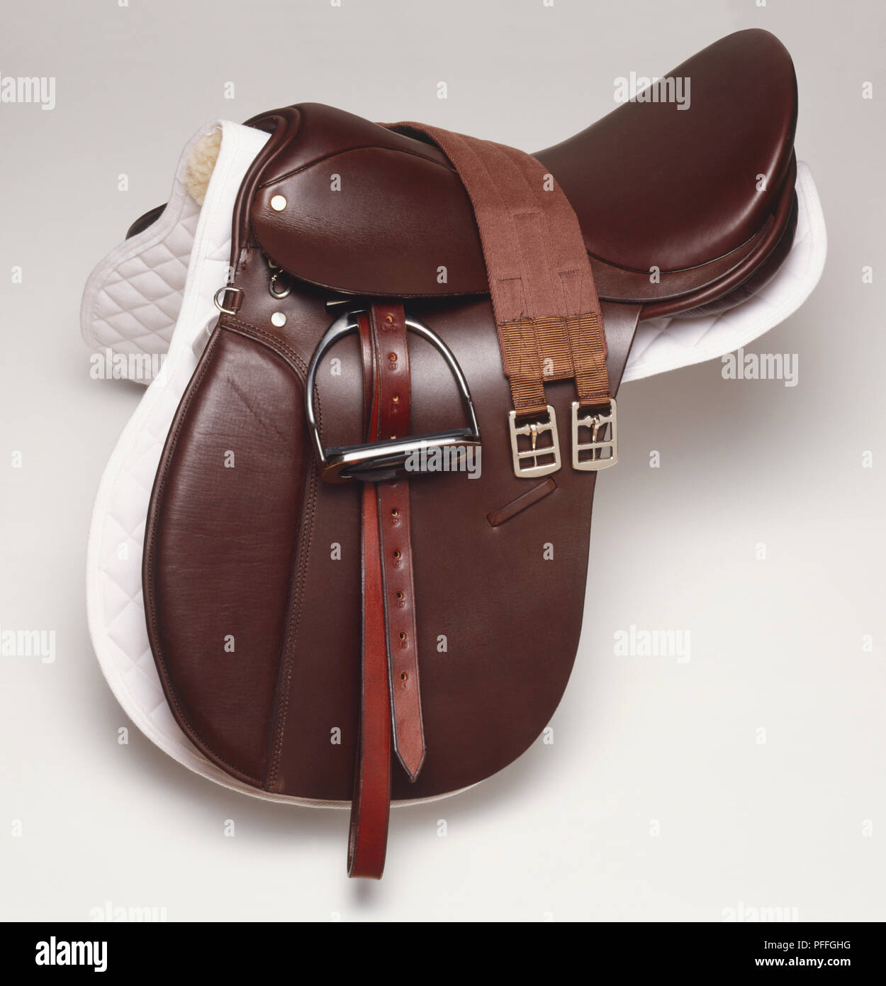 Brown leather horse riding saddle, side view Stock Photo - Alamy